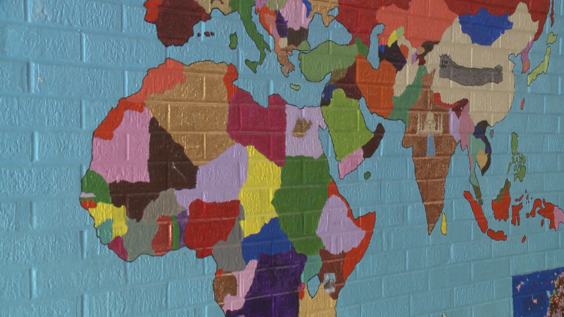 Students create painting of the world on school wall | wbir.com