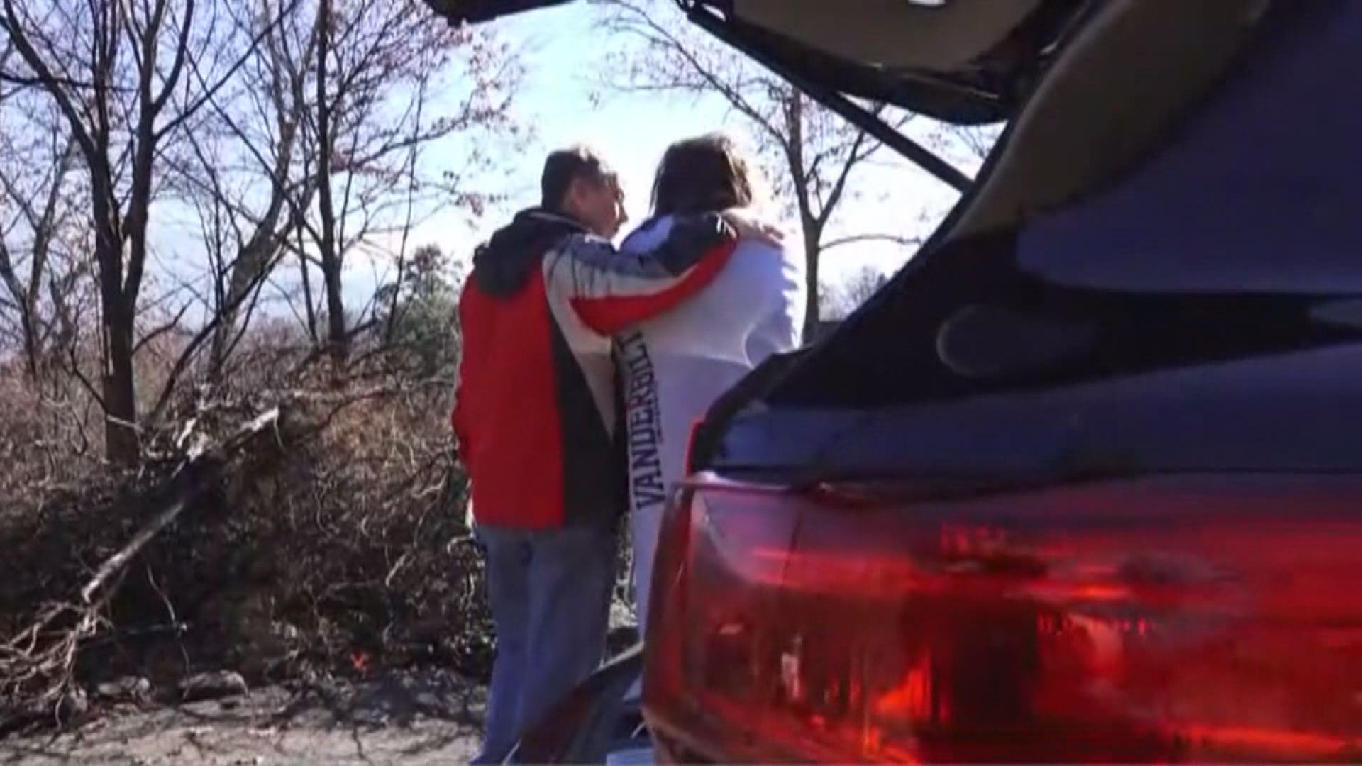Family makes emotional discovery among cabin ruins | wcnc.com