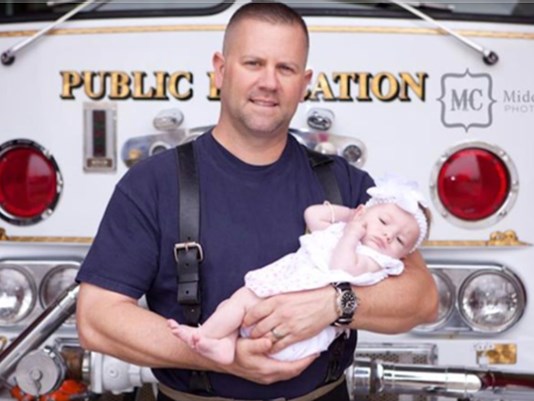 Fireman adopts baby girl after he delivers her | wbir.com